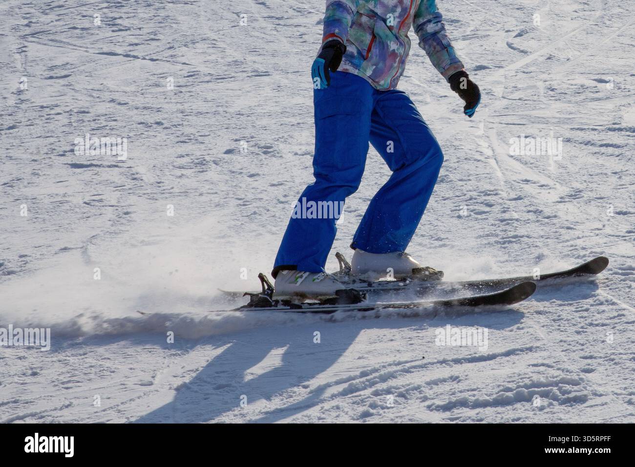 Skier legs on snowy slope at Poltava winter resort in Ukraine on ...
