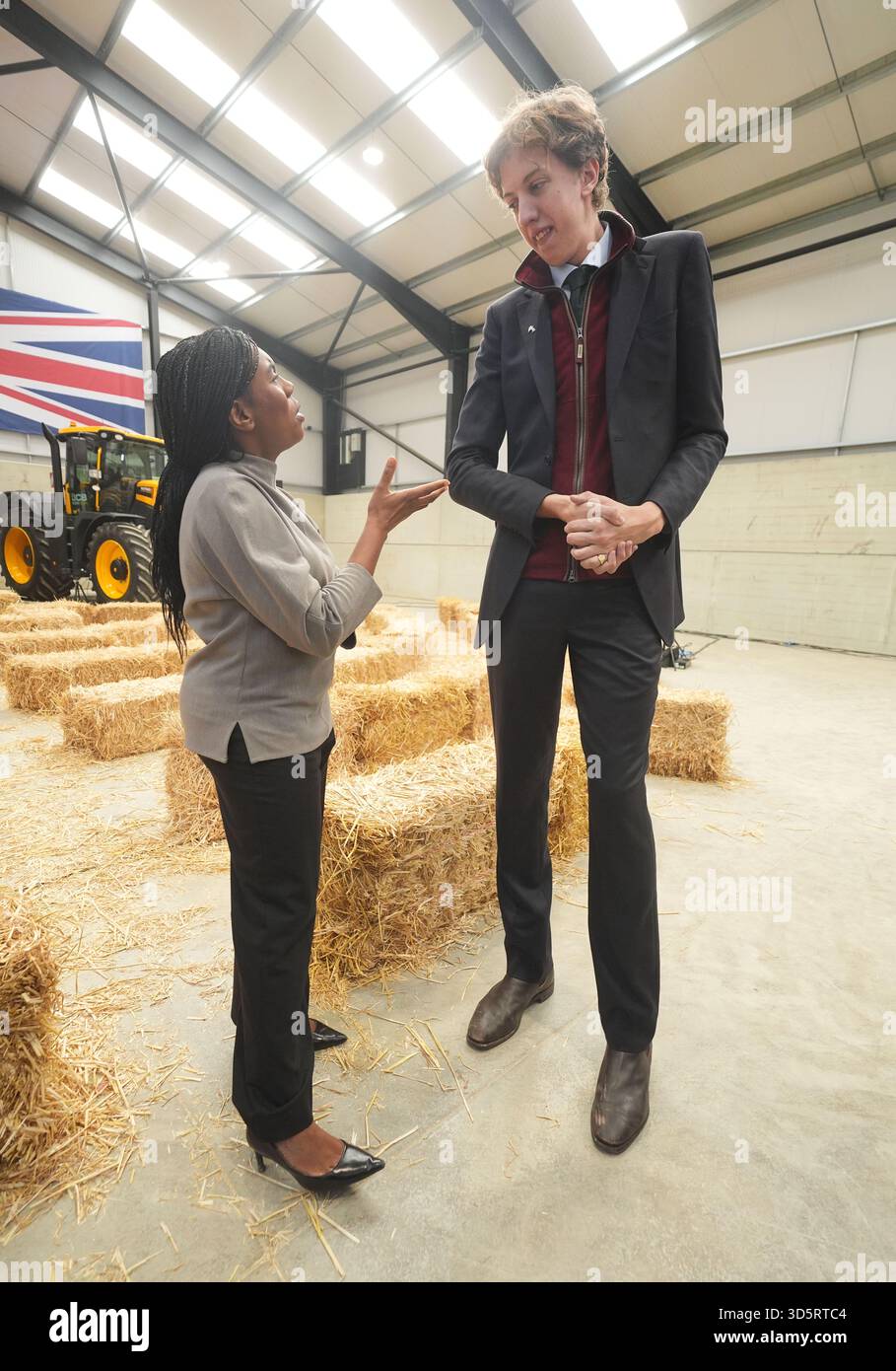 Conservative Party leader Kemi Badenoch speaks to student James ...