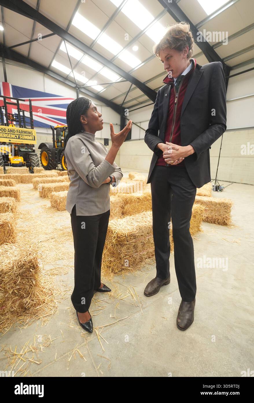 Conservative Party leader Kemi Badenoch speaks to student James ...