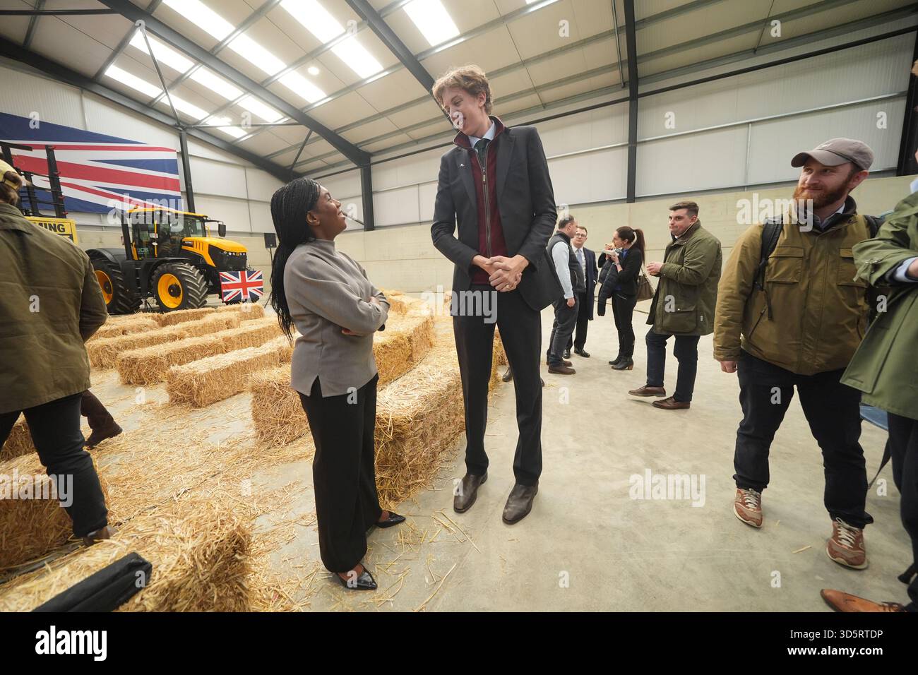 Conservative Party leader Kemi Badenoch speaks to student James ...