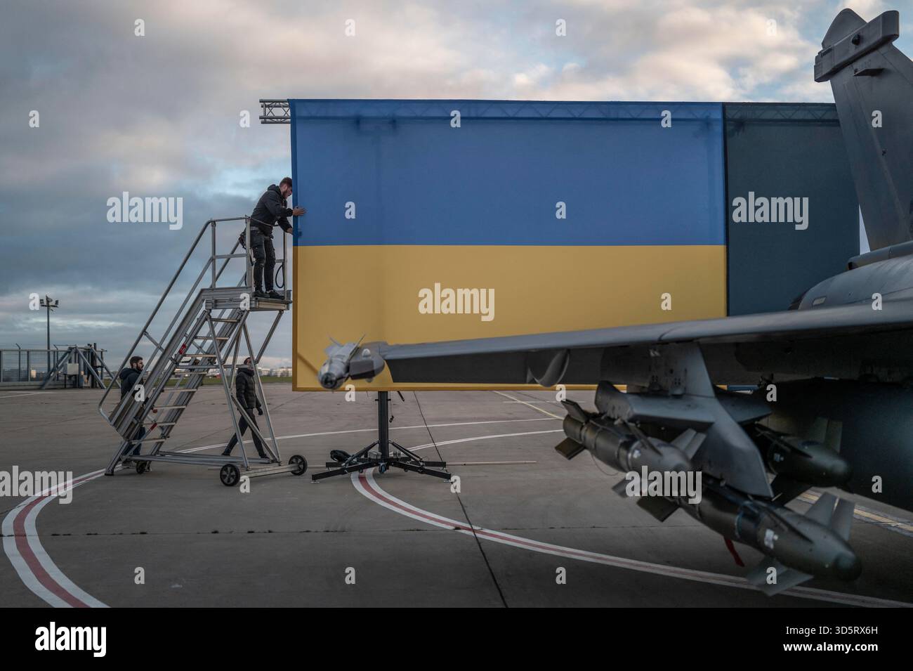 Workers prepare for the arrival of Ukrainian President Volodymyr ...