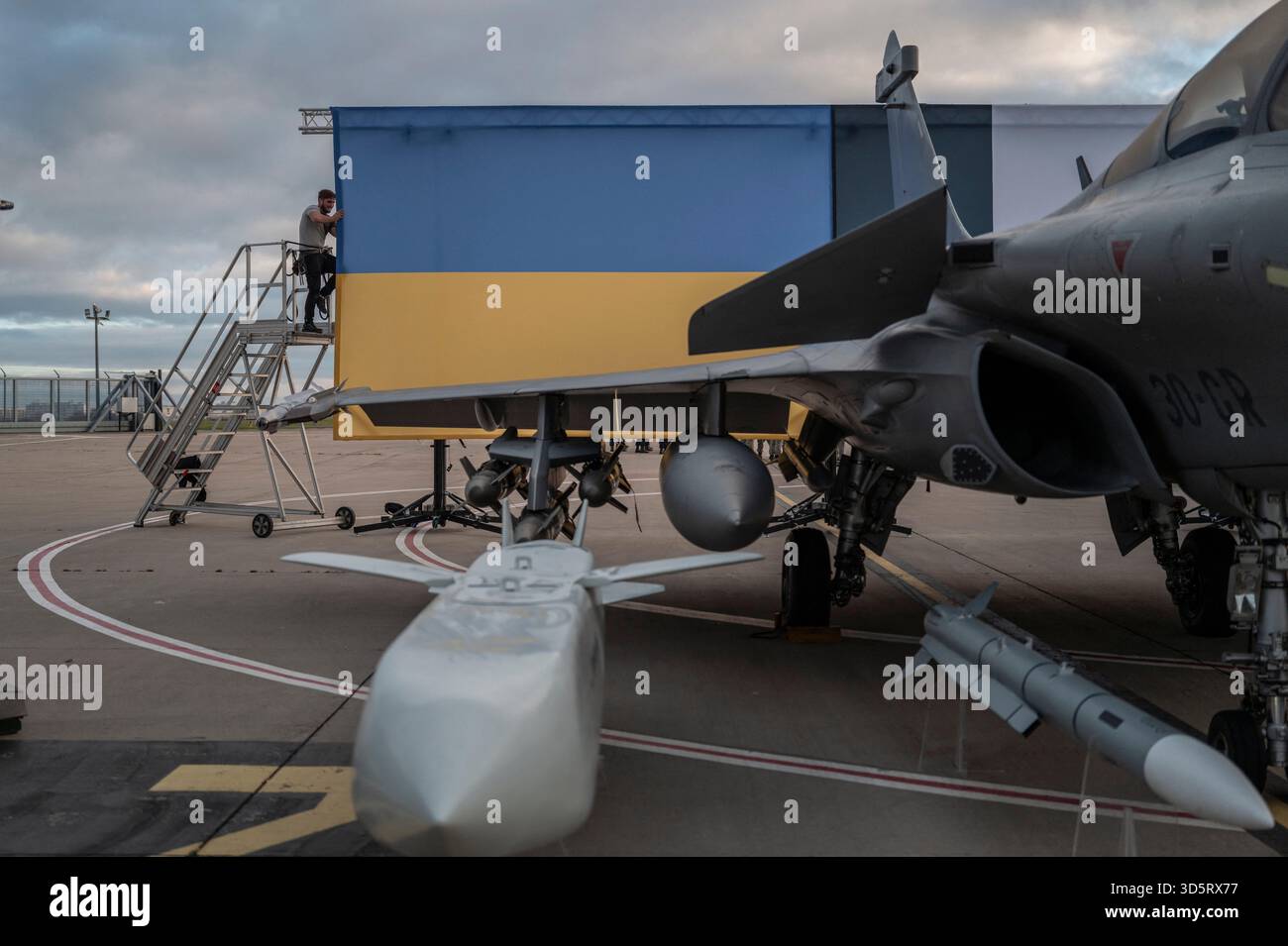 Workers prepare for the arrival of Ukrainian President Volodymyr ...
