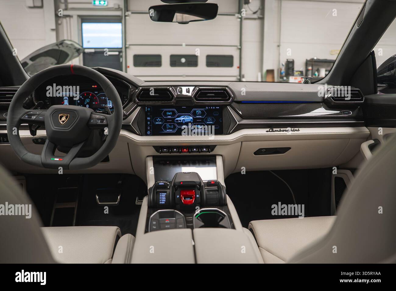 Lamborghini Urus cockpit in workshop view from second row seats Stock ...
