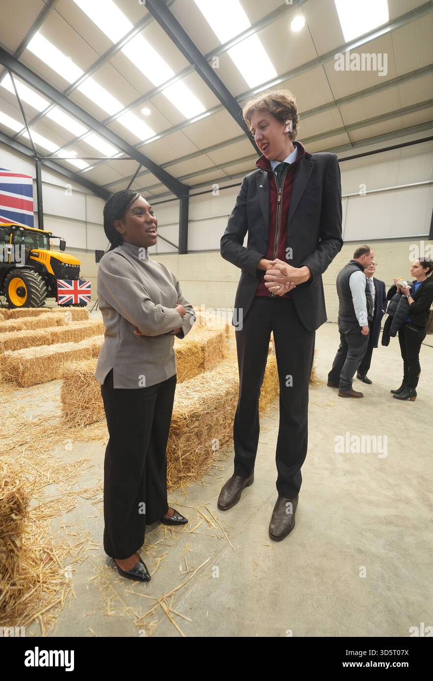 Conservative Party leader Kemi Badenoch speaks to student James ...