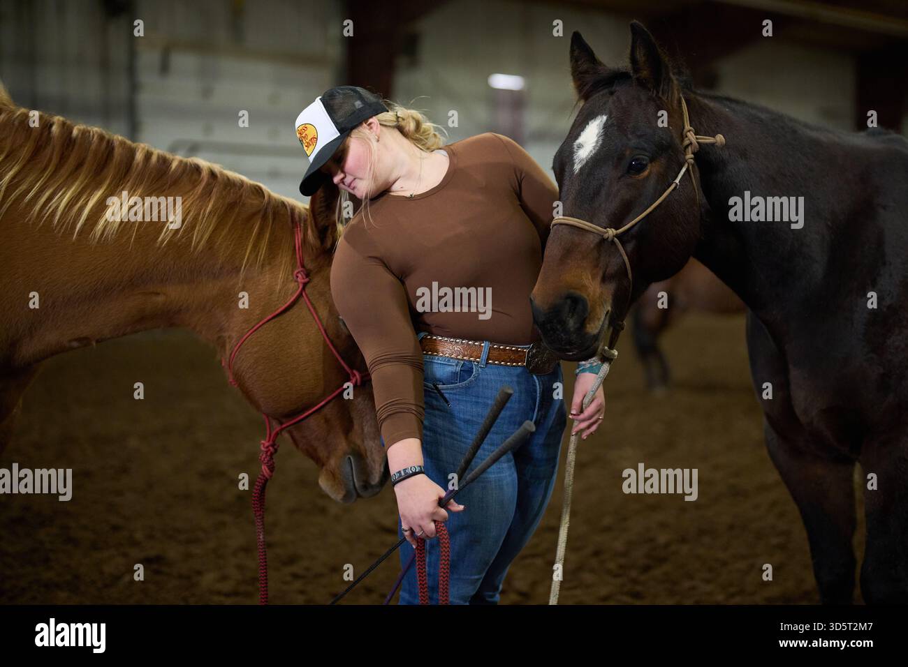 Avery Zeiszler works with horses during a class in the Nueta Hidatsa ...