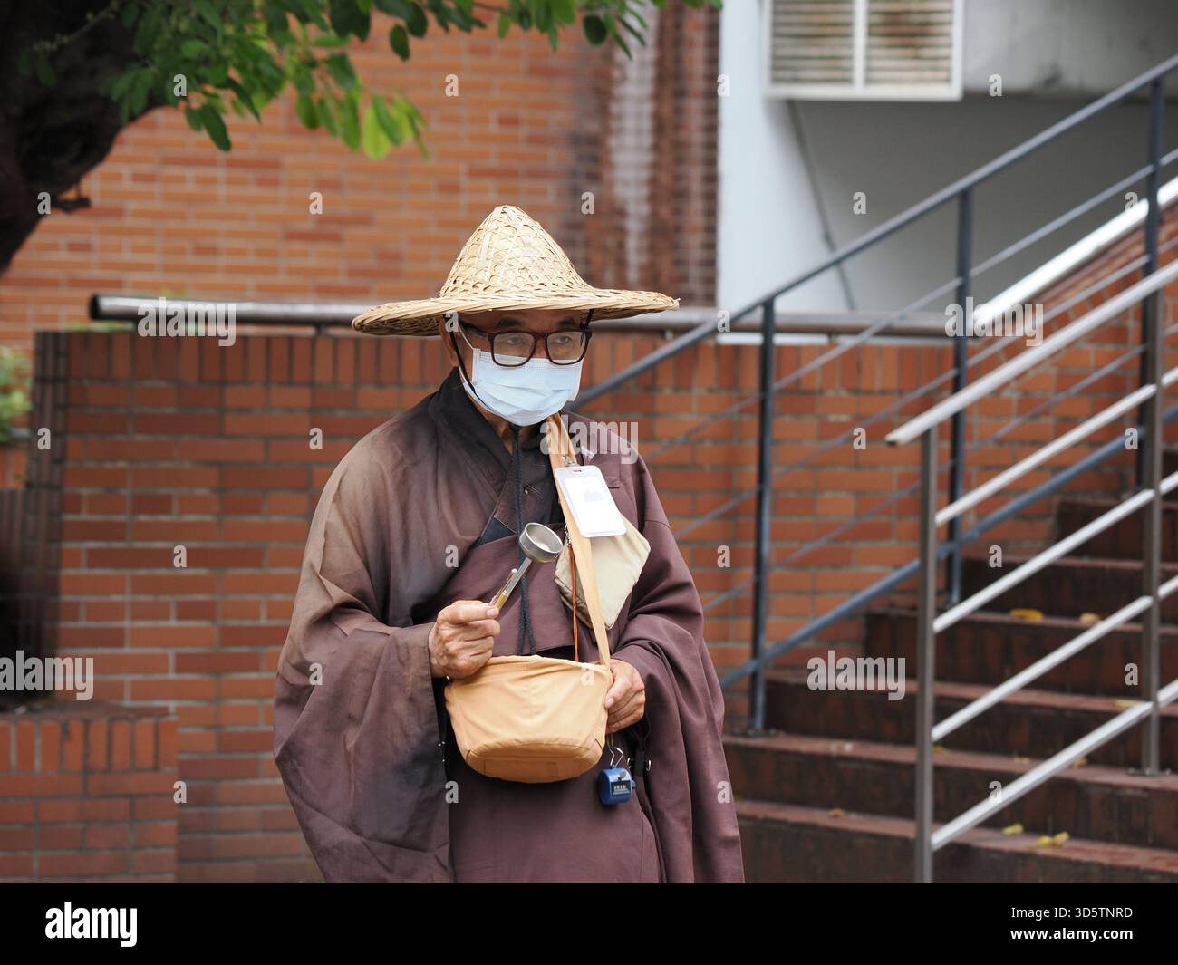 Buddhist monk wearing conical hat hi-res stock photography and images ...