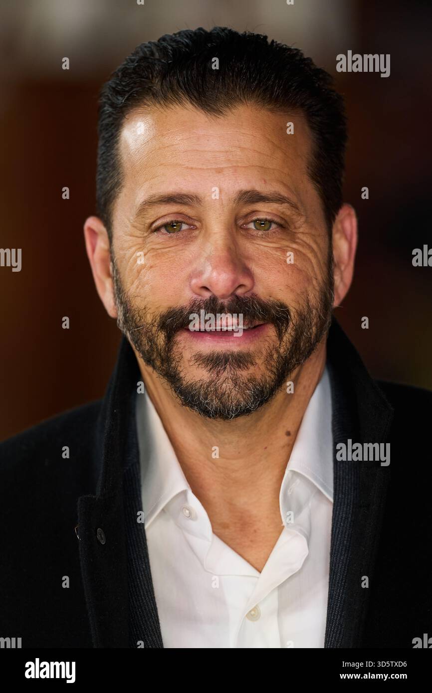 David Glasser poses for photographers upon arrival at the UK premiere ...