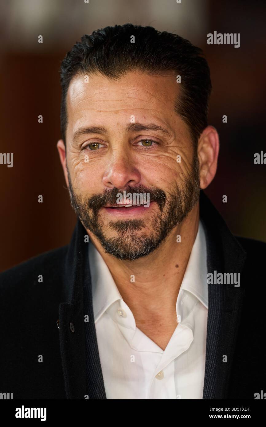 David Glasser poses for photographers upon arrival at the UK premiere ...