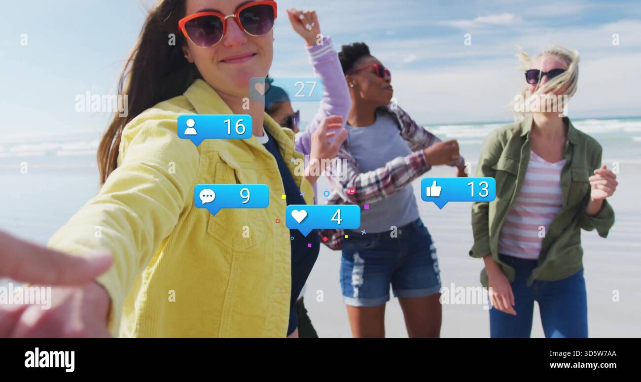 Taking woman in yellow jacket holding smartphone for selfie at ocean ...