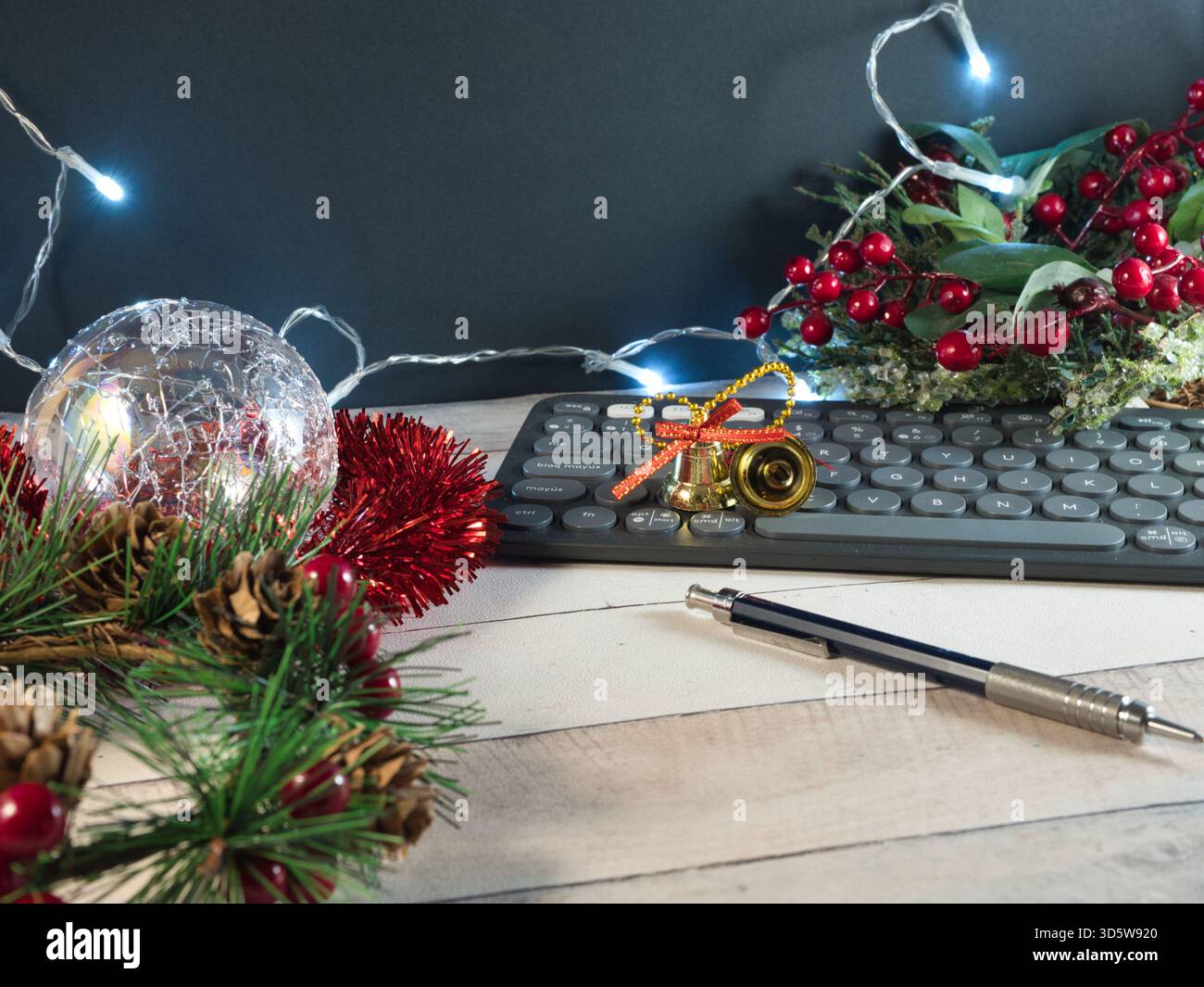 Festive Desk with Christmas Lights - Christmas-themed desk setup with ...