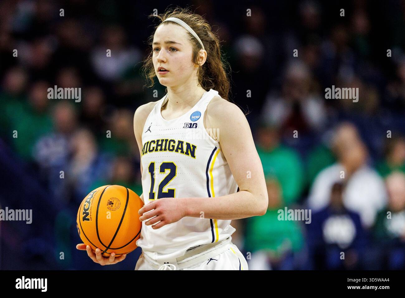 FILE - Michigan guard Syla Swords (12) controls the ball during the second half in the first ...