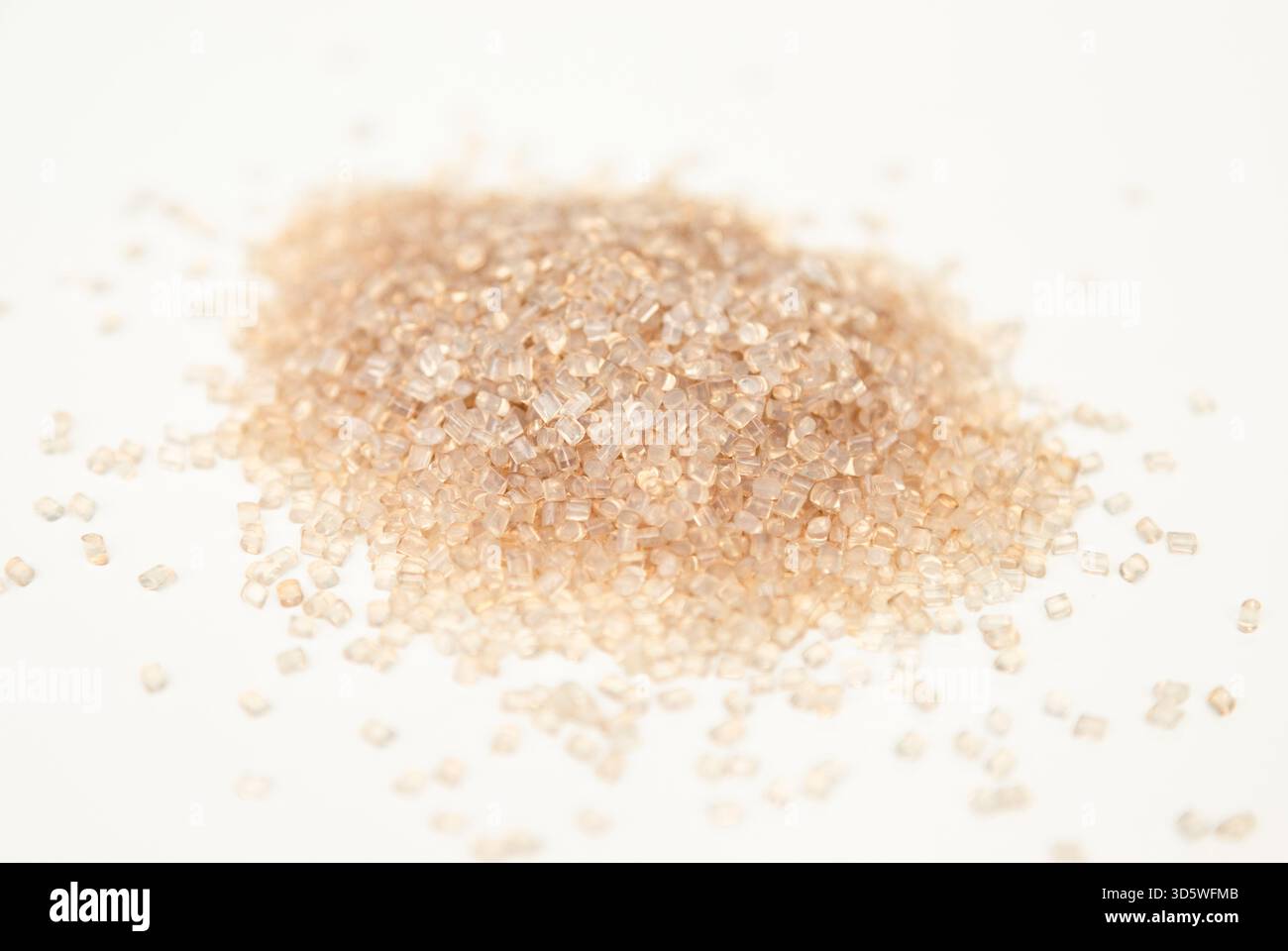 Amber-Tinted Plastic Pellets for Industrial Manufacturing Stock Photo ...