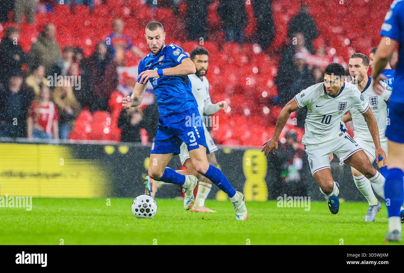 London, UK. 13th Nov, 2025. Serbia's Strahinja Pavlovic and England's ...