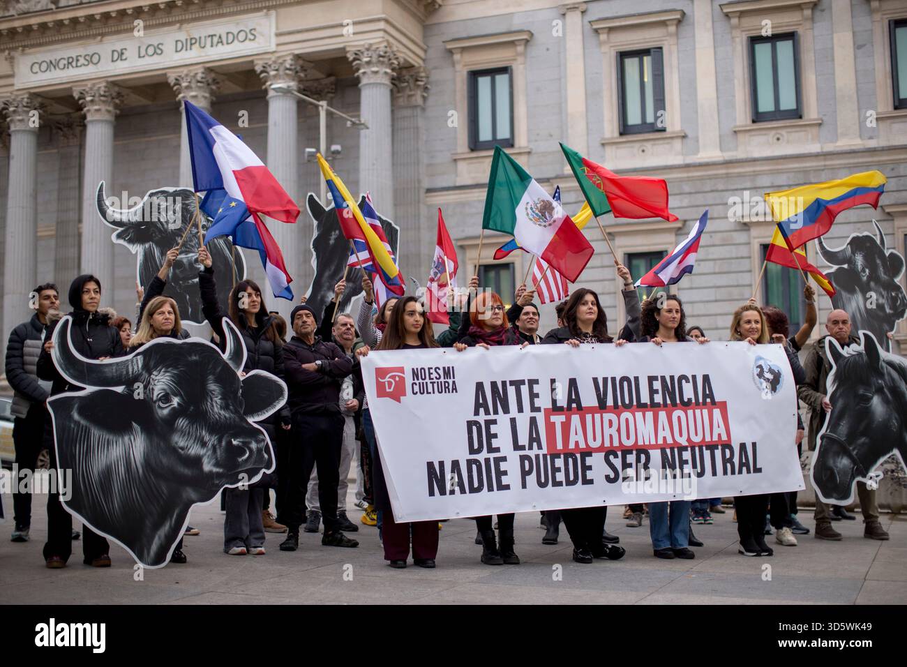 Protesters hold a banner during a demonstration demanding the abolition ...