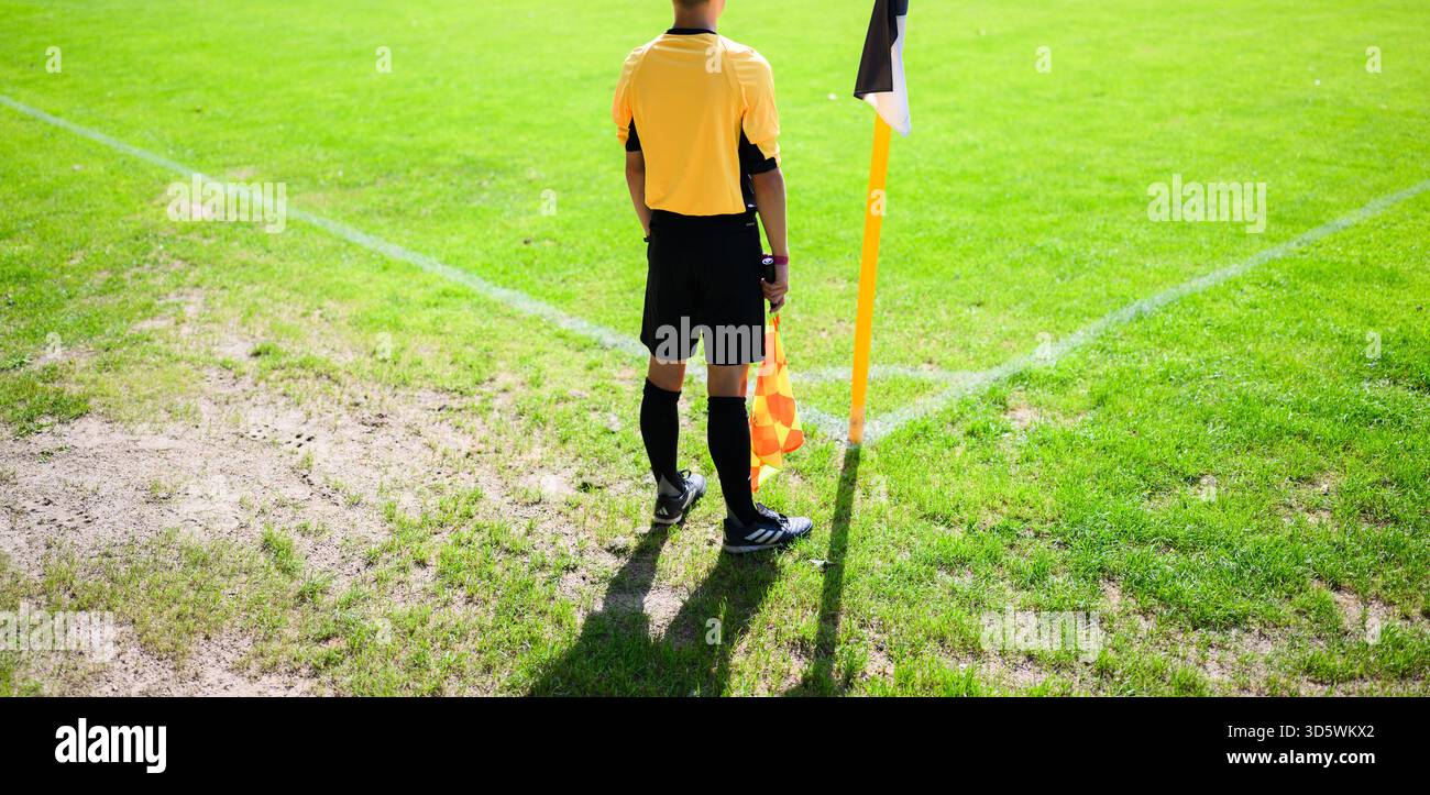 PRODUCTION - 10 August 2025, Lower Saxony, Hanover: A young referee ...