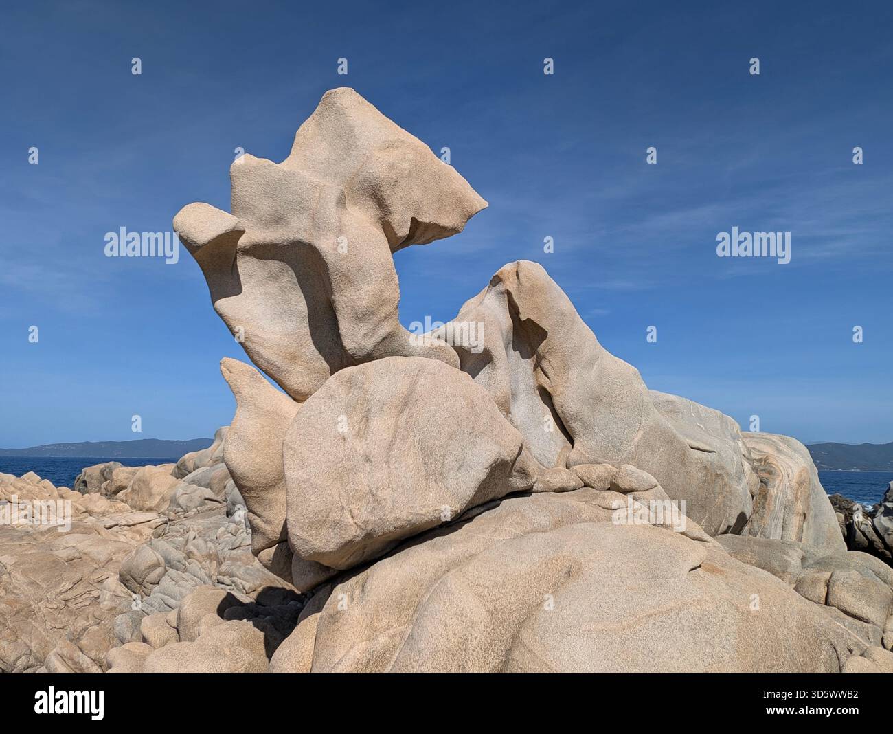 the bizarre granite weathering formations called tafoni on the coast of ...