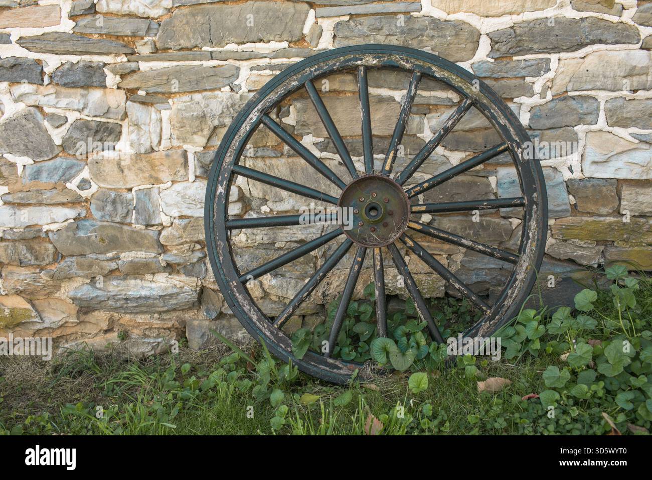 Wooden Amish barn rustic farm equipment Stock Photo - Alamy