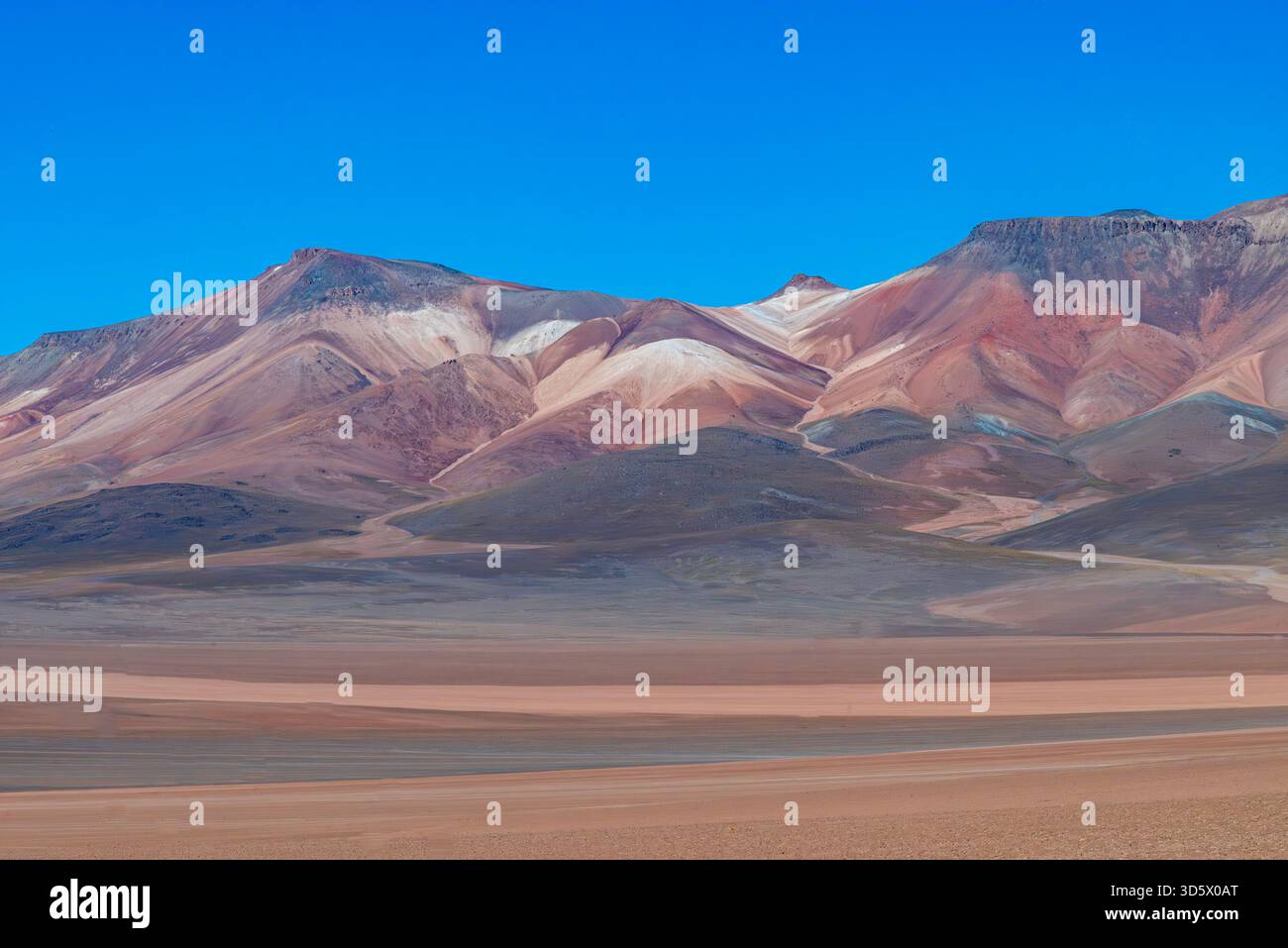 Colorful stratified mountains of the Bolivian Altiplano under a deep ...