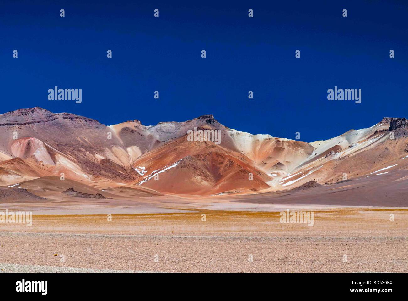 Colorful stratified mountains of the Bolivian Altiplano under a deep ...
