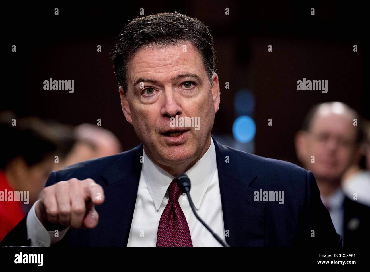 FILE - Former FBI Director James Comey speaks during a Senate ...