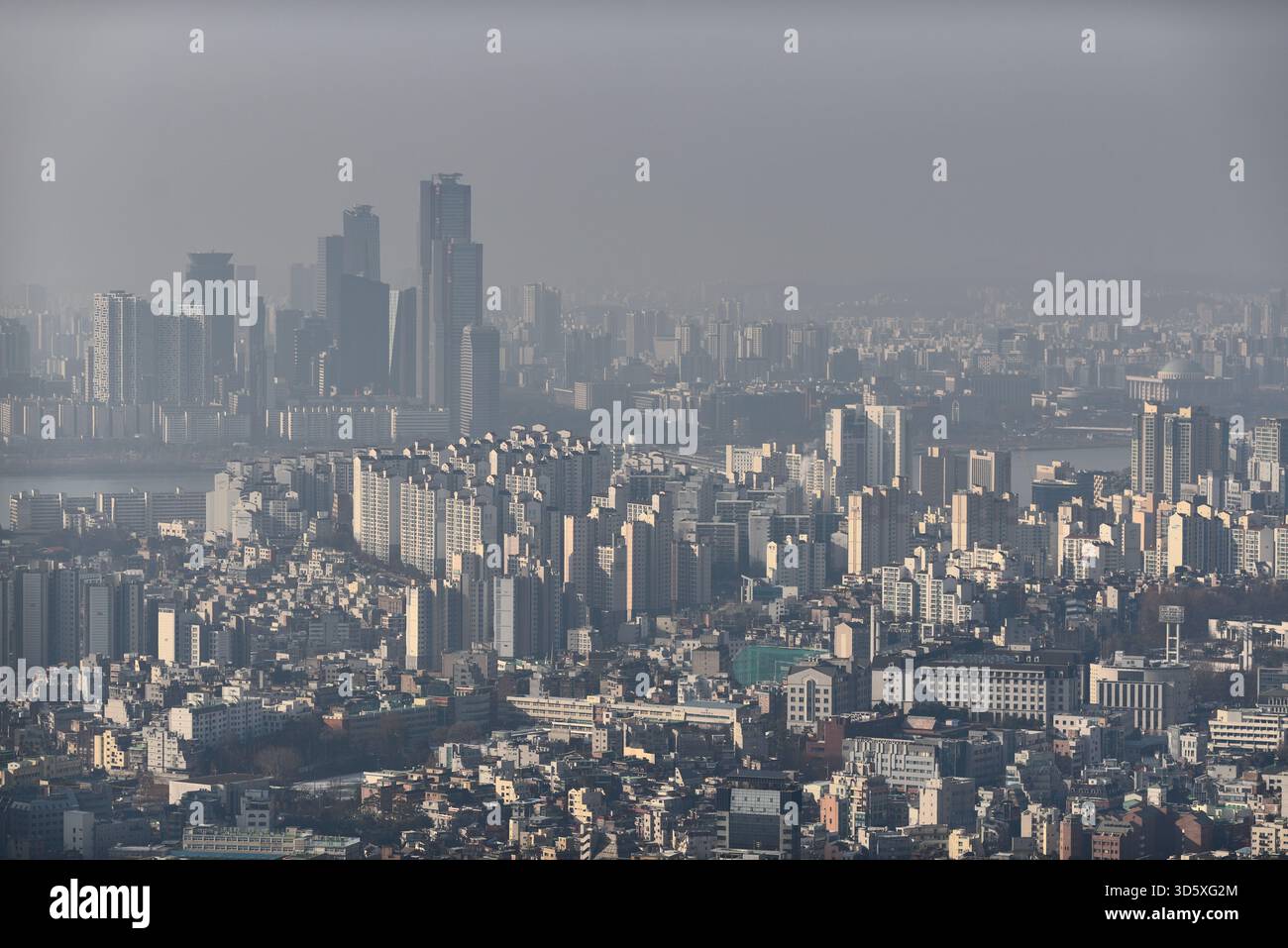 Smog and yellow dust pollution covering cityscape of Seoul, capital of ...