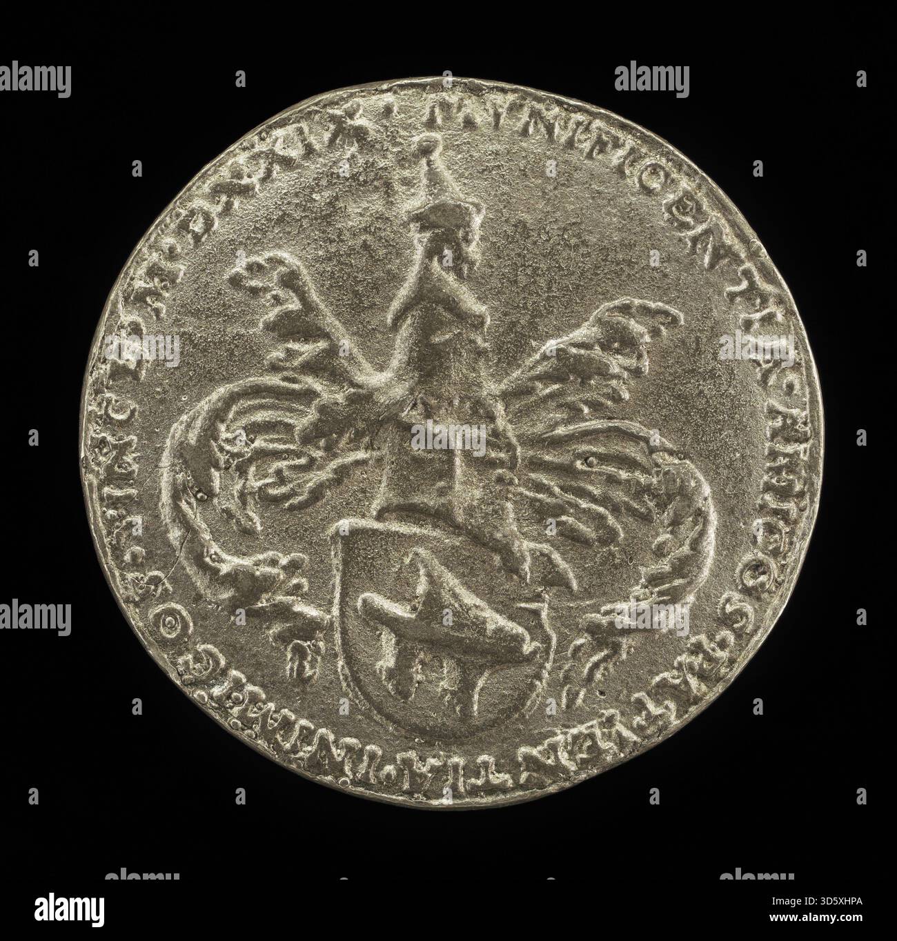 A reverse depiction of a shield of arms with crest and mantling by ...