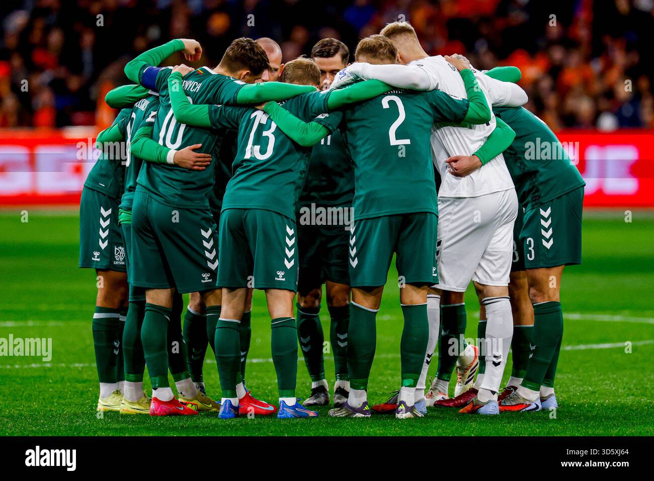 team of Lithuania form a huddle during the FIFA World Cup 2026 ...
