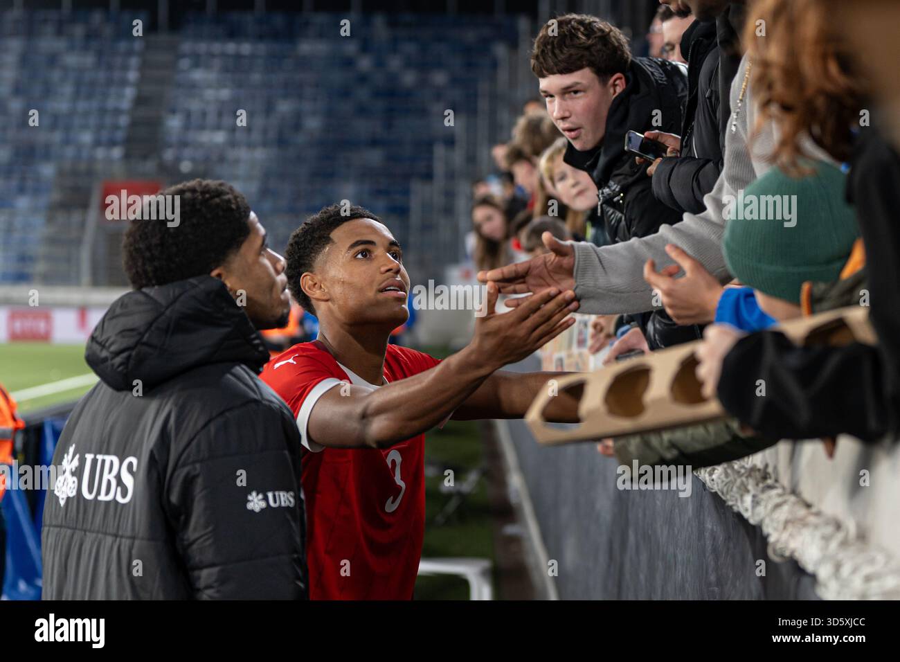 Sascha Britschgi (3 Switzerland) cheering with fans after the UEFA ...