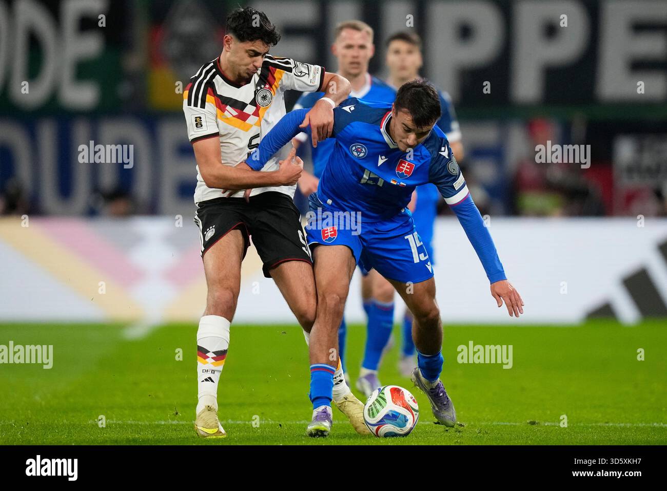 Germany's Aleksandar Pavlovic, left, and Slovakia's David Strelec fight ...