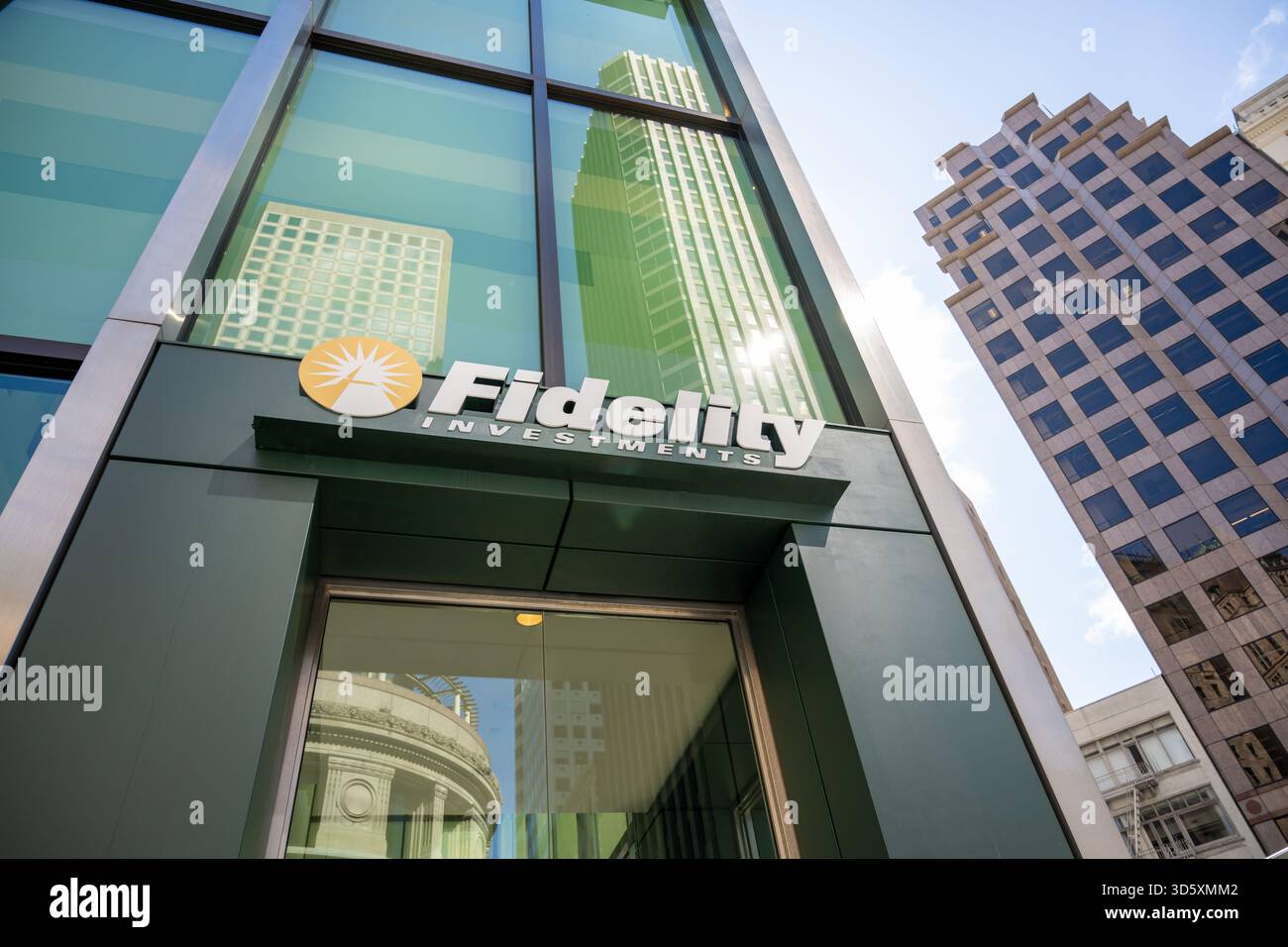 Facade of Fidelity Investments office with reflected skyscrapers on ...