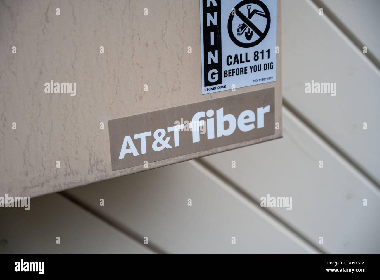 Decal on utility box with text reading AT&T Fiber, referring to fiber ...