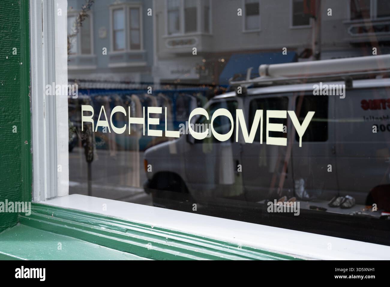 Storefront window with Rachel Comey logo and green trim, showing ...
