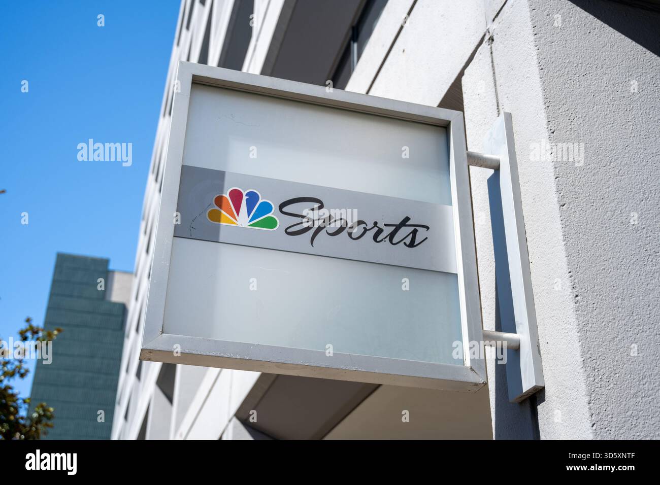 NBC Sports sign featuring multicolor peacock logo on office building ...