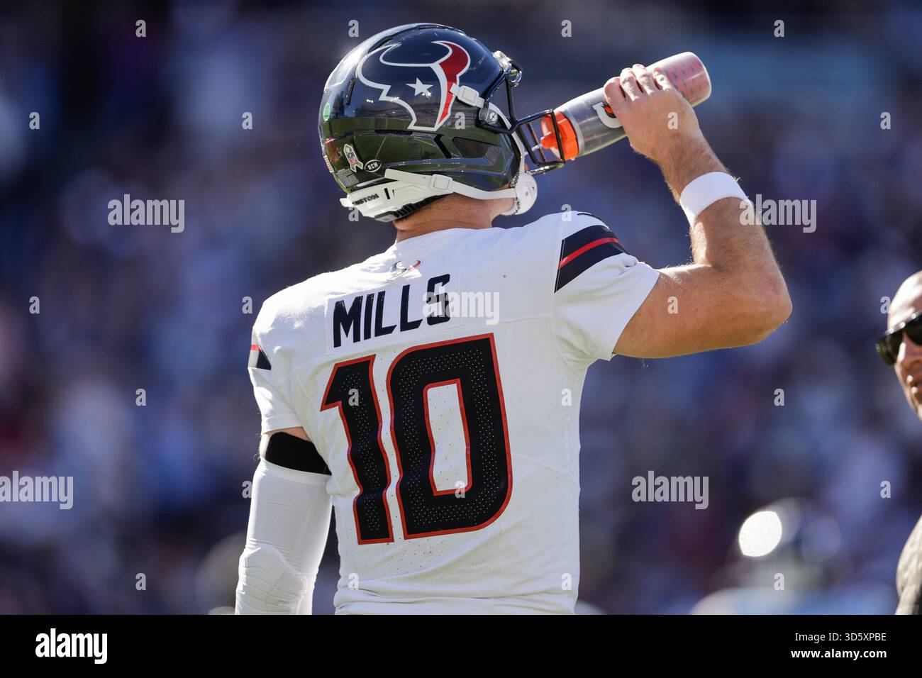 Houston Texans quarterback Davis Mills (10) drinks from a Gatorade ...