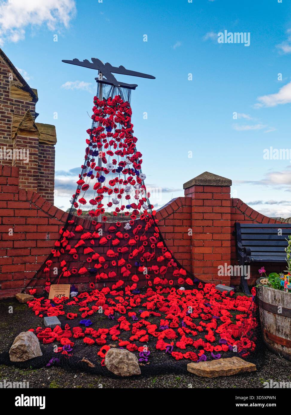 Lancaster bomber and crocheted poppy display for Remembrance Sunday 09 ...