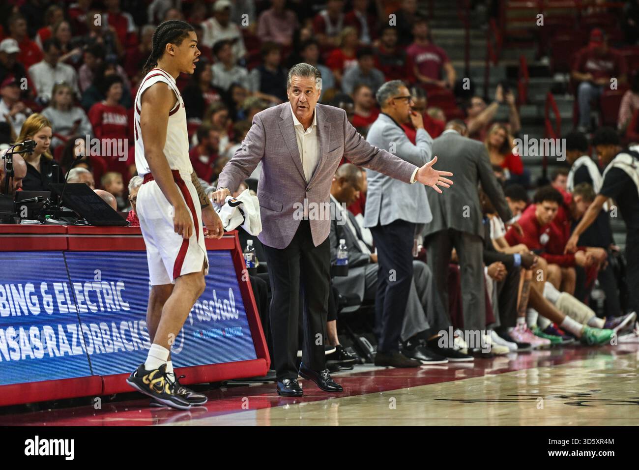 Arkansas coach John Calipari talks with Arkansas guard Darius Acuff Jr ...