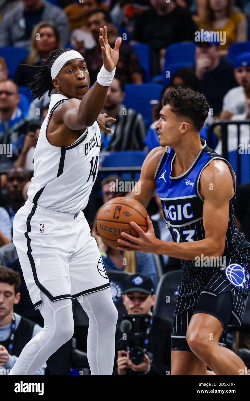 Brooklyn Nets guard Terance Mann (14) defends Orlando Magic forward ...