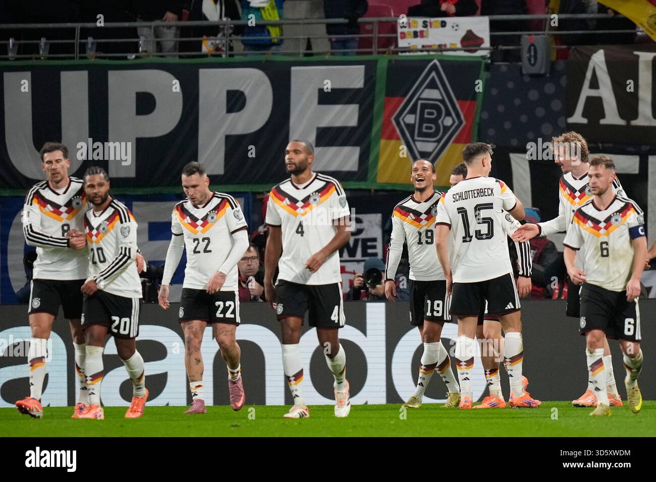 German players celebrate after scoring during a group A World Cup ...