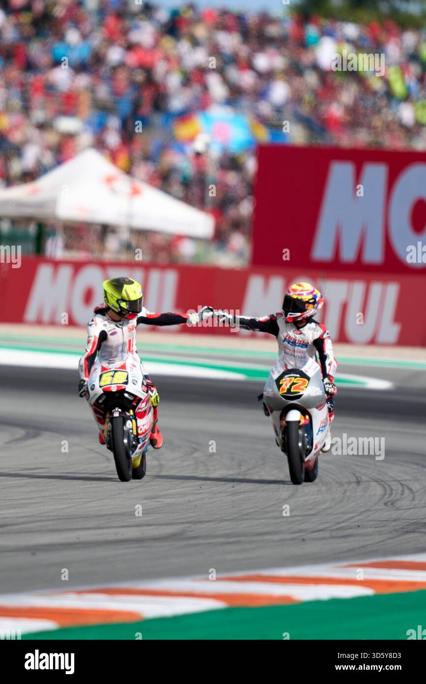 Luca Lunetta (SIC58 Squadra Corse), Taiyo Furusato (Honda Team Asia) in ...