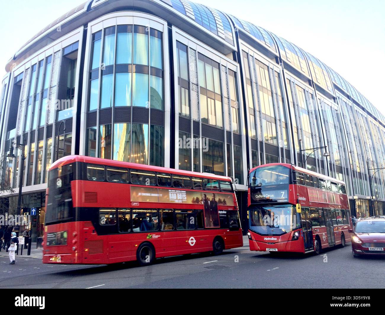 Park House building and double-decker red busses in Oxford Street ...