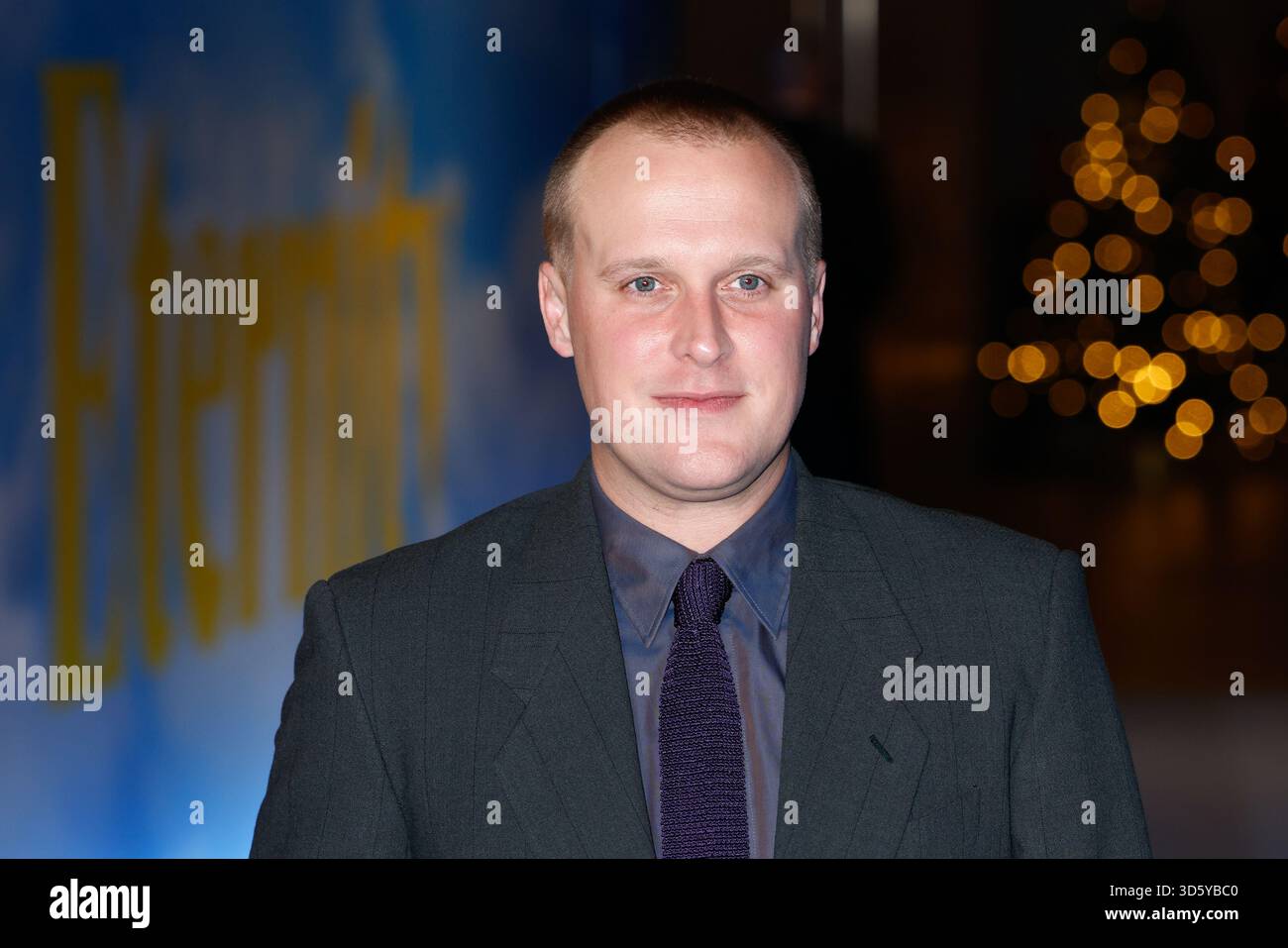John Early poses for photographers upon arrival at the premiere of the ...