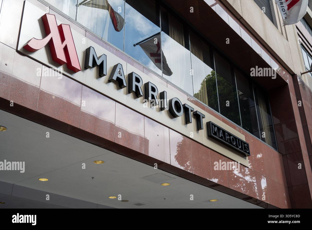 Facade and entrance signage for Marriott Marquis hotel with logo ...