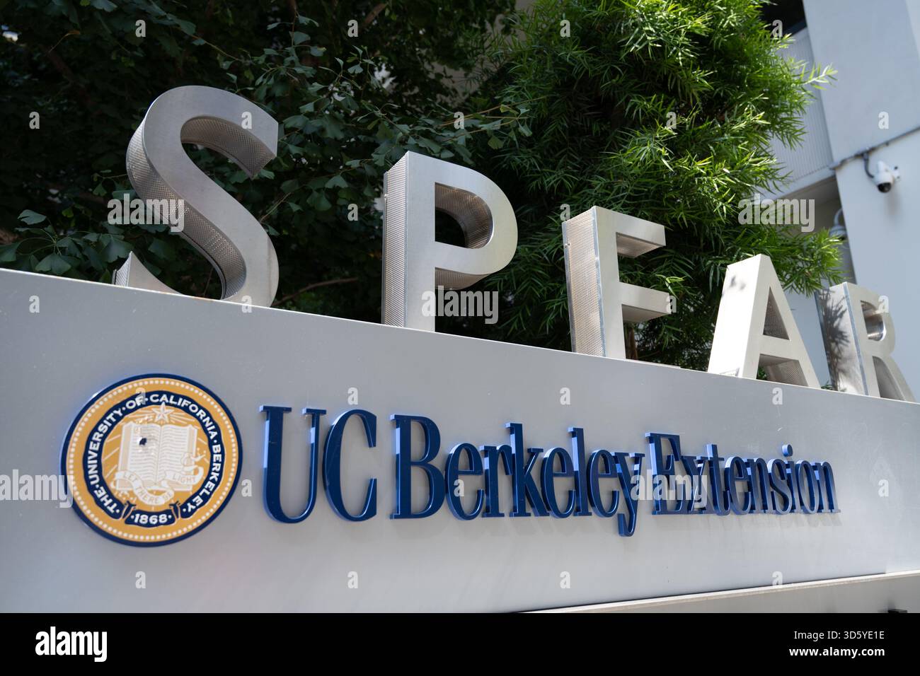 UC Berkeley Extension exterior sign with University of California seal at Spear Street location ...