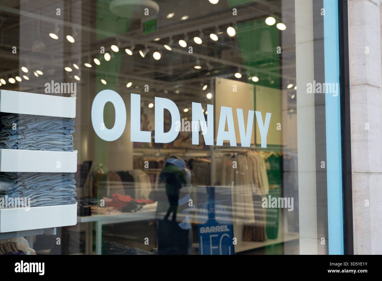 Old Navy store window with logo and folded jeans display, San Francisco ...