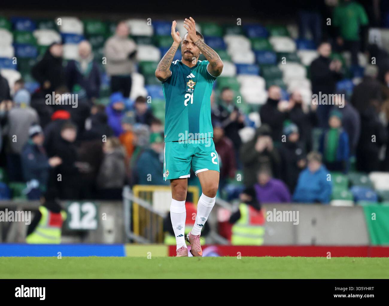 Northern Ireland's Josh Magennis celebrates victory after the FIFA ...