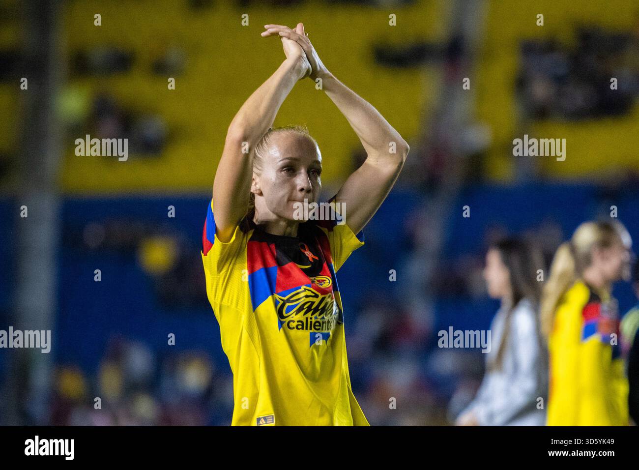 Sarah Luebbert #22 of Club America greets the fans during the second ...