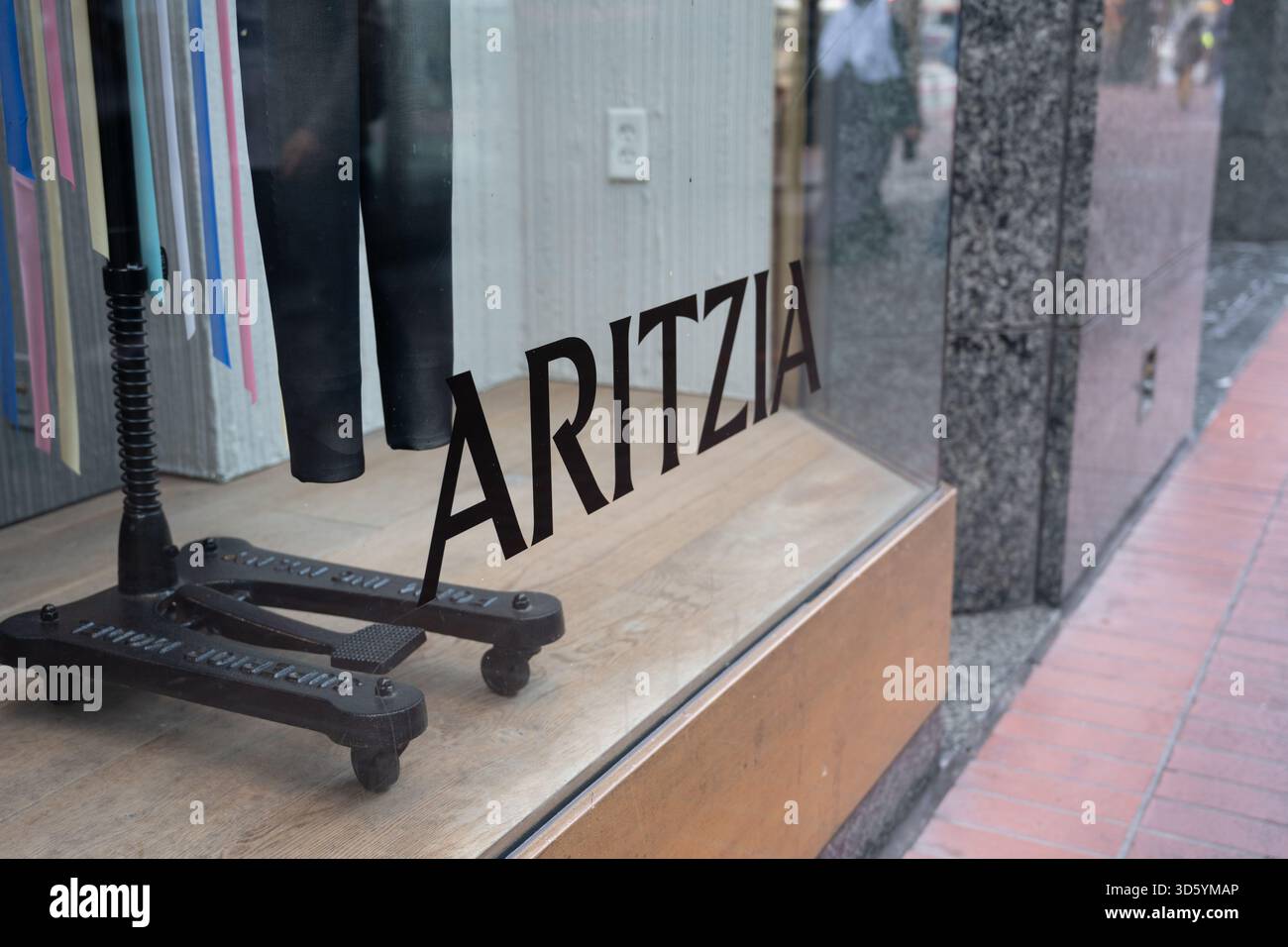 Aritzia storefront window with logo and clothing display, San Francisco ...