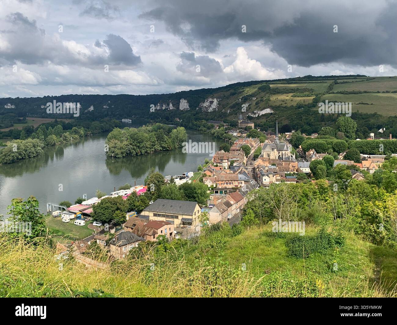Vernon French France cyclists Town sign grass verge people tourists ...