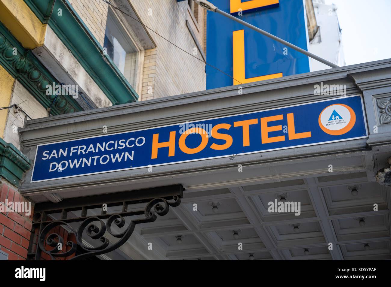 Exterior sign for San Francisco Downtown Hostel on historic building ...