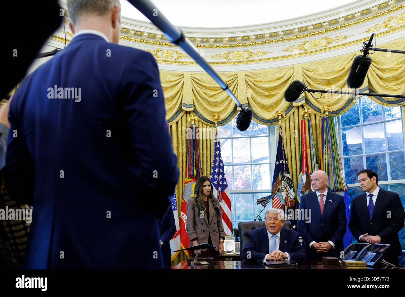 US Secretary of Homeland Security Kristi Noem (C-L) FIFA President ...